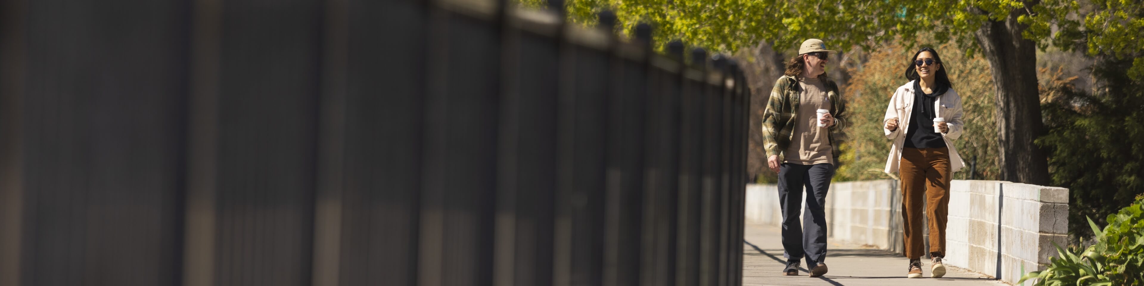 Forsake New Arrivals featuring a man and woman walking on a sidewalk.